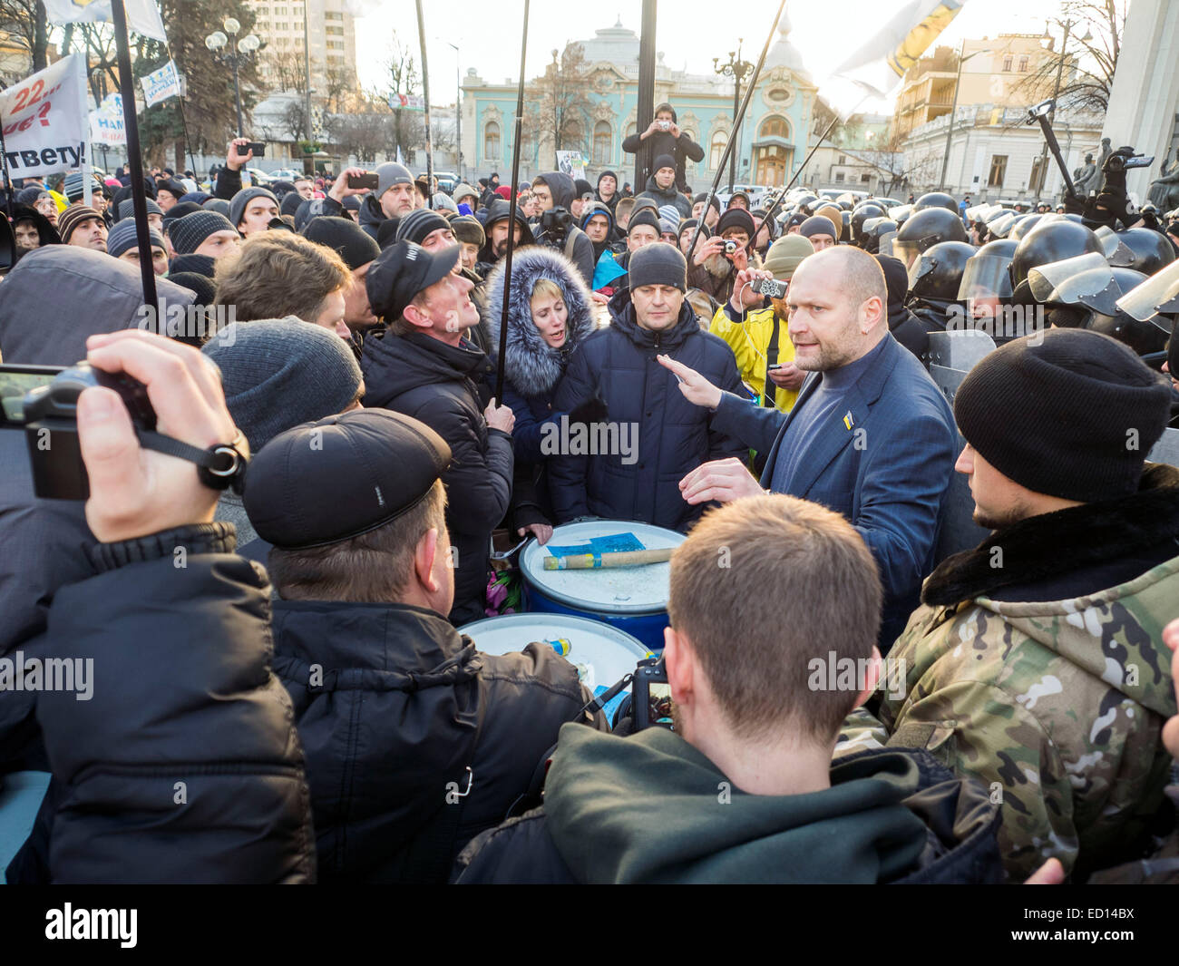 Kiev, Ukraine. 23rd Dec, 2014. Deputy Borislav Bereza tries to calm ...