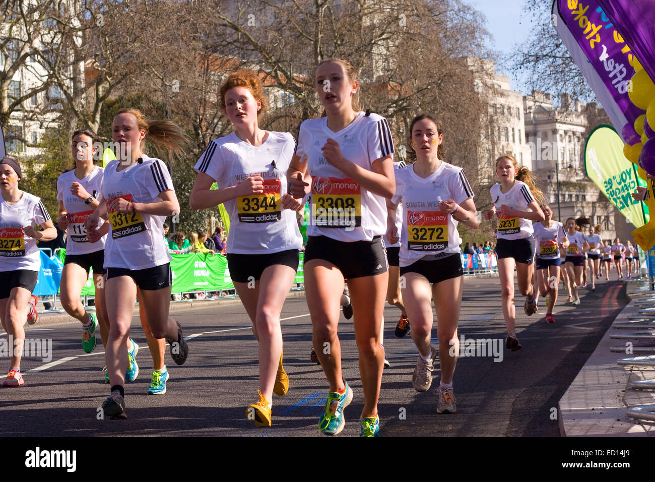 LONDON - APRIL 13: Unidentified girls run the London marathon on April ...