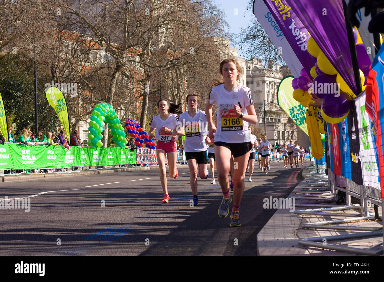 LONDON - APRIL 13: Unidentified girls run the London marathon on April ...