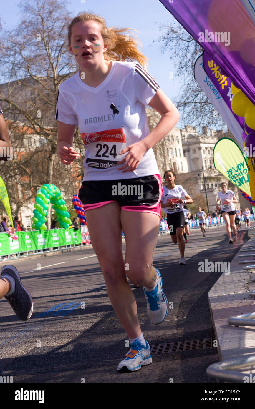 LONDON - APRIL 13: Unidentified girls run the London marathon on April ...