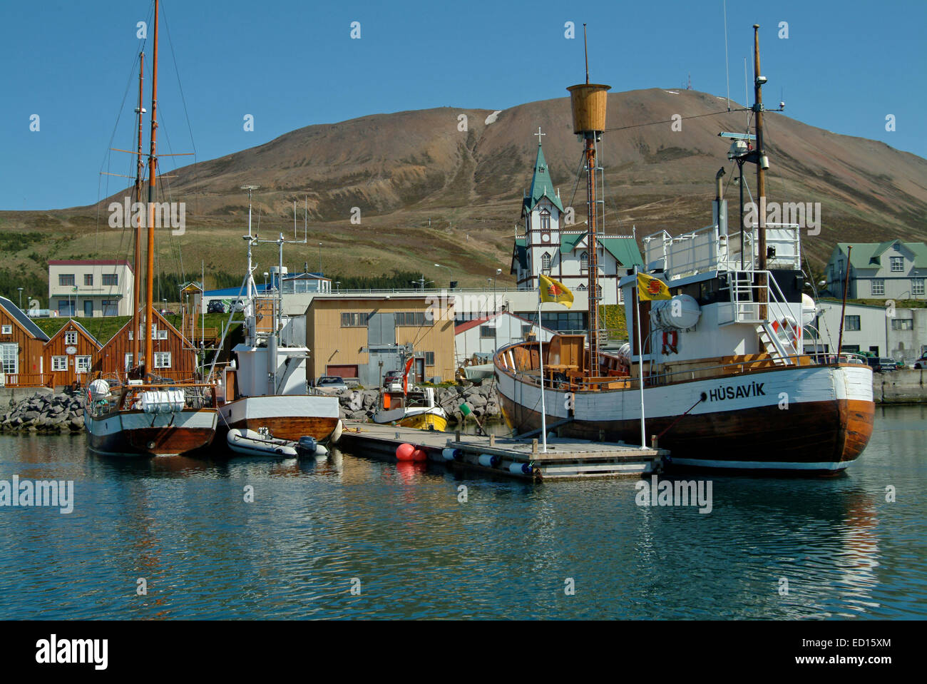 Husavik harbour showing whale-watching boats and the Husavik Whale ...