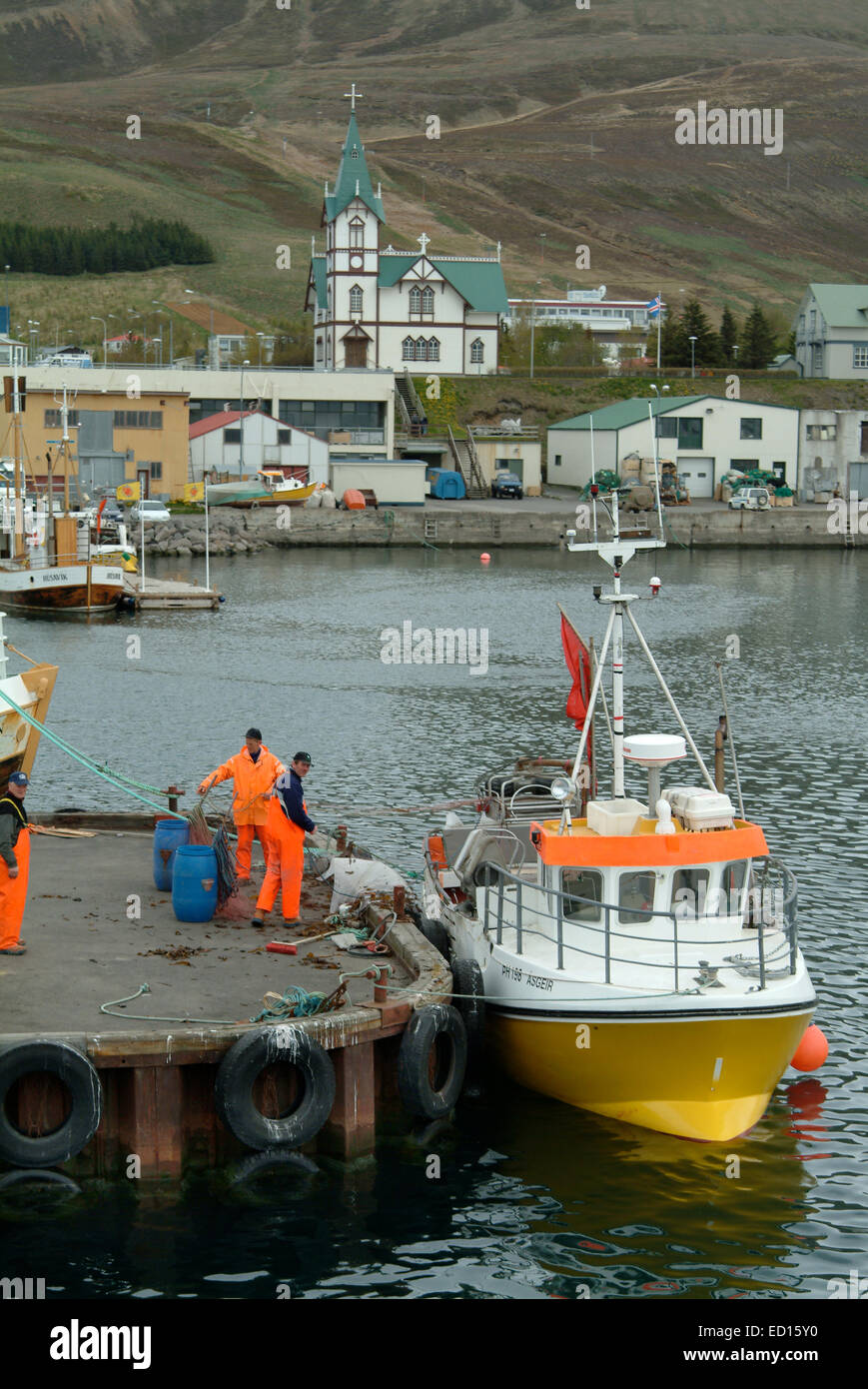 Husavik harbour showing whale-watching boats and the Husavik Whale ...