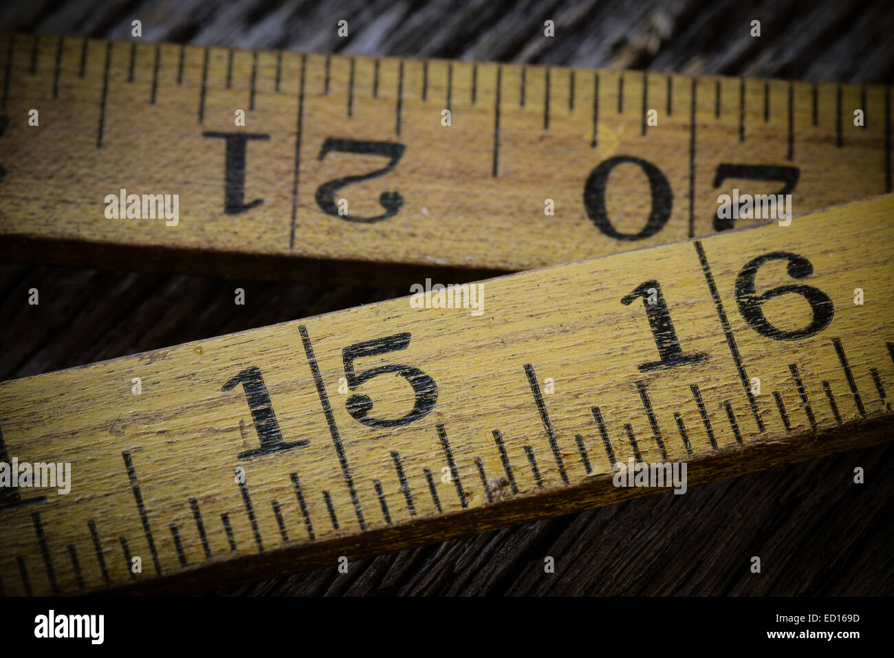 Old Tape Measure on Rustic Wood Background Stock Photo - Alamy