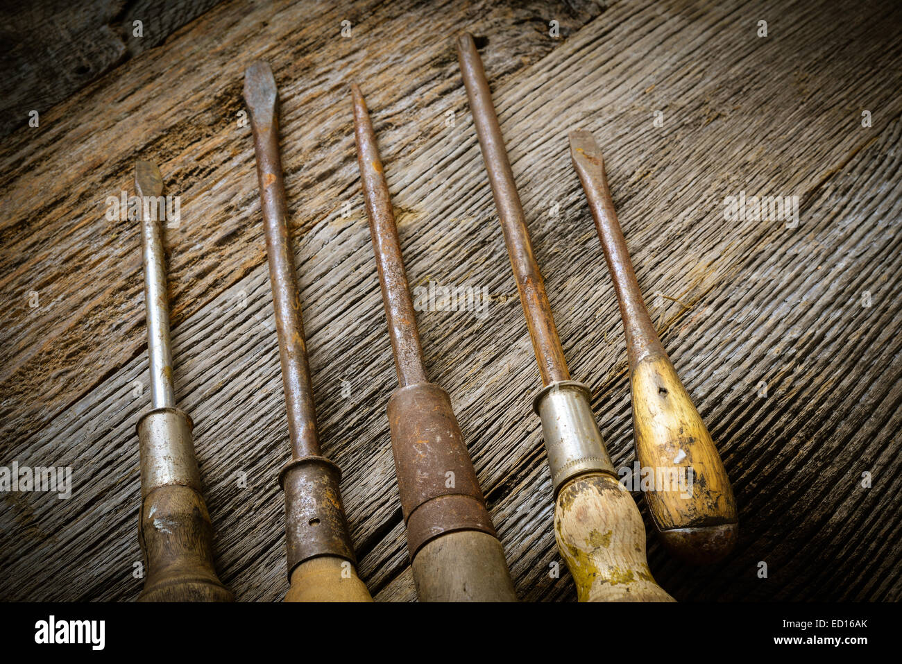 Rustic Screwdrivers on Wood Background Stock Photo - Alamy