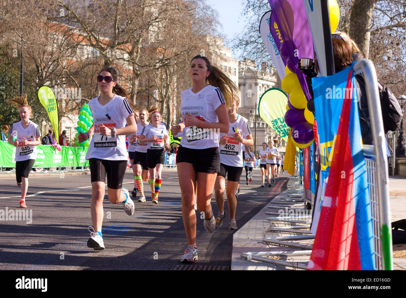 LONDON - APRIL 13: Unidentified girls run the London marathon on April ...