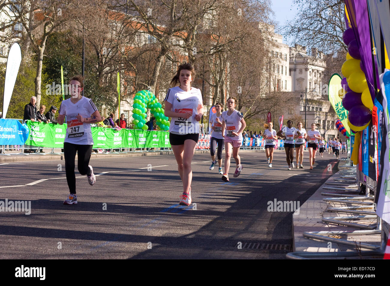 LONDON - APRIL 13: Unidentified girls run the London marathon on April ...