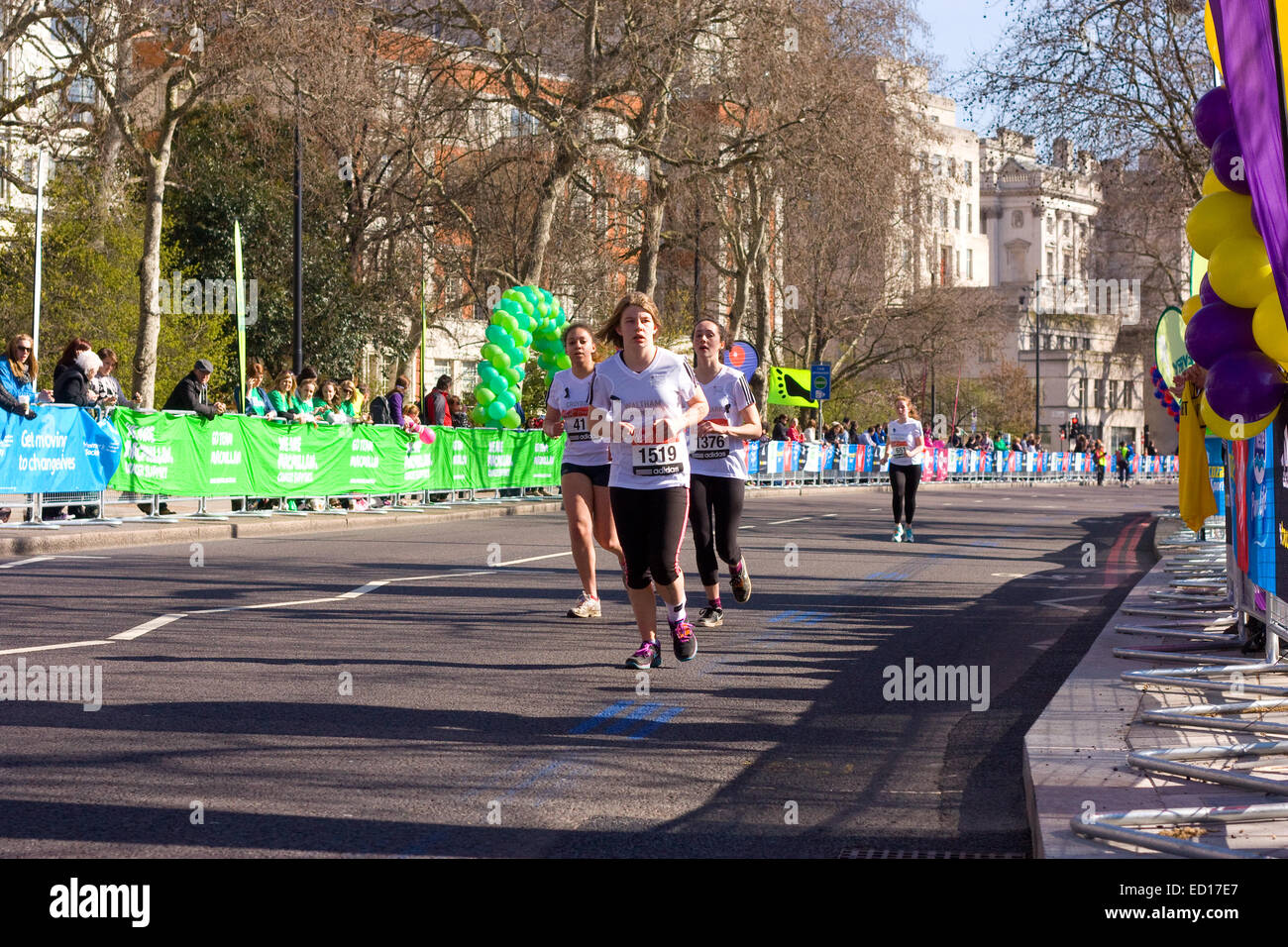 LONDON - APRIL 13: Unidentified girls run the London marathon on April ...