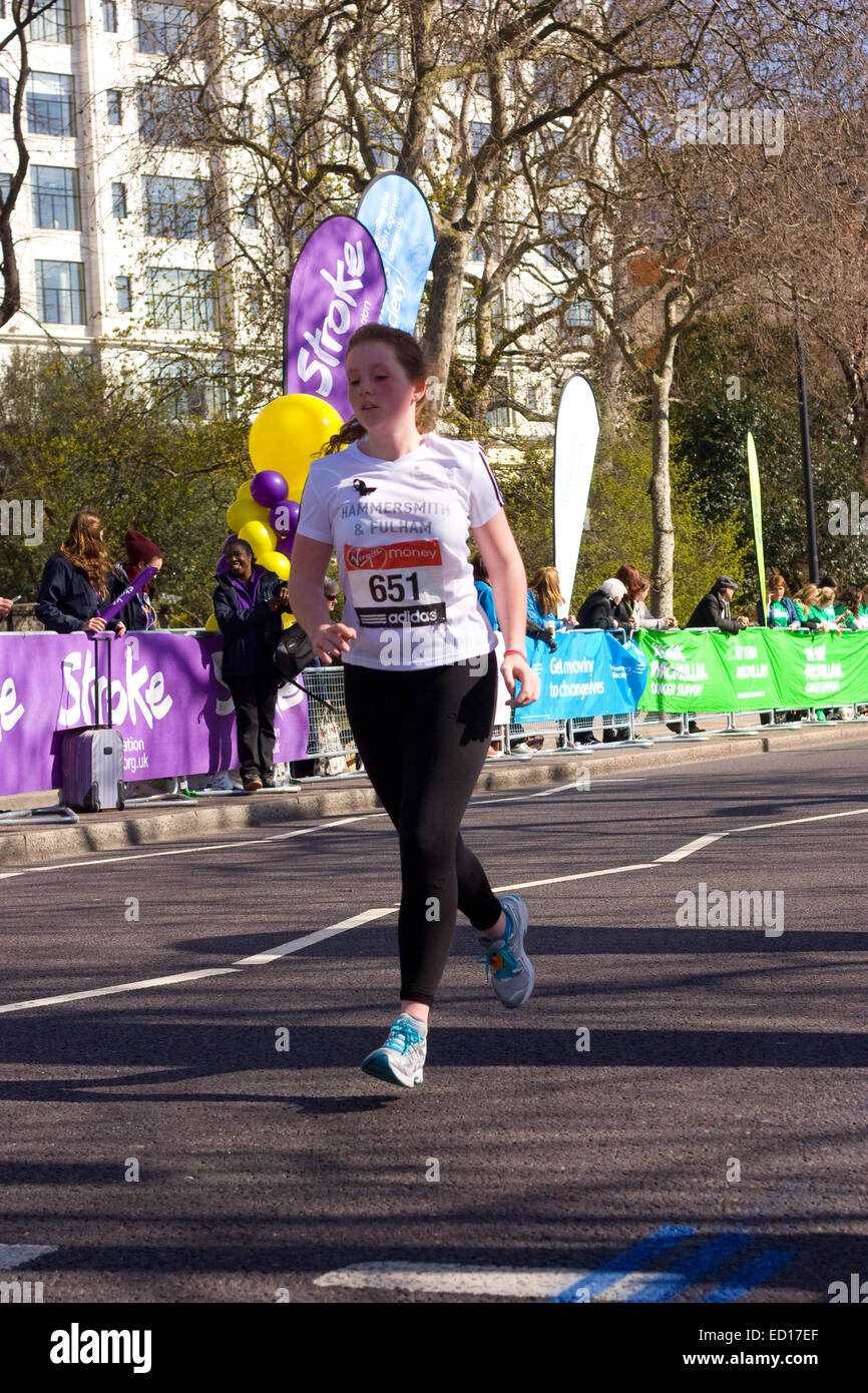 LONDON - APRIL 13: Unidentified girls run the London marathon on April ...