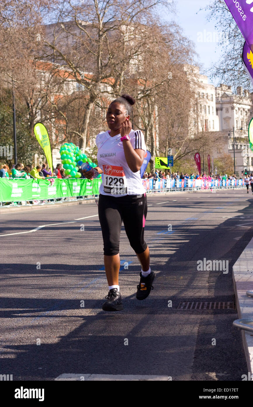 LONDON - APRIL 13: Unidentified girls run the London marathon on April ...