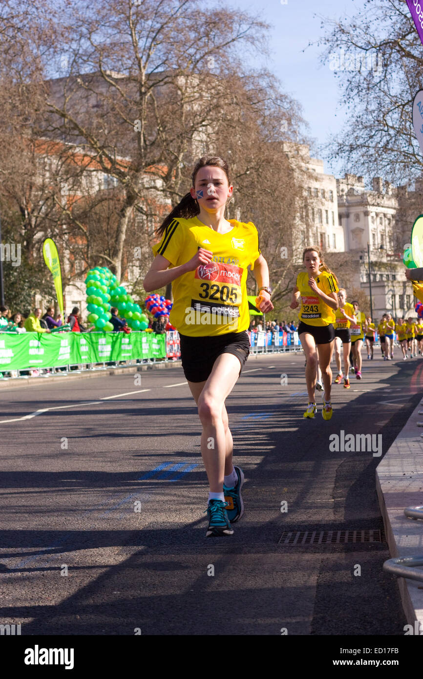 LONDON - APRIL 13: Unidentified girls run the London marathon on April ...