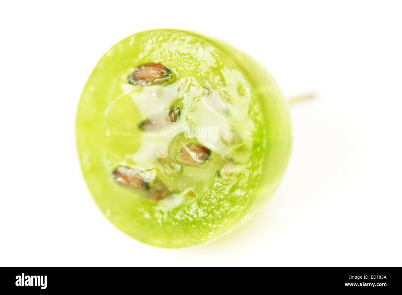 sliced gooseberry isolated on white background Stock Photo - Alamy