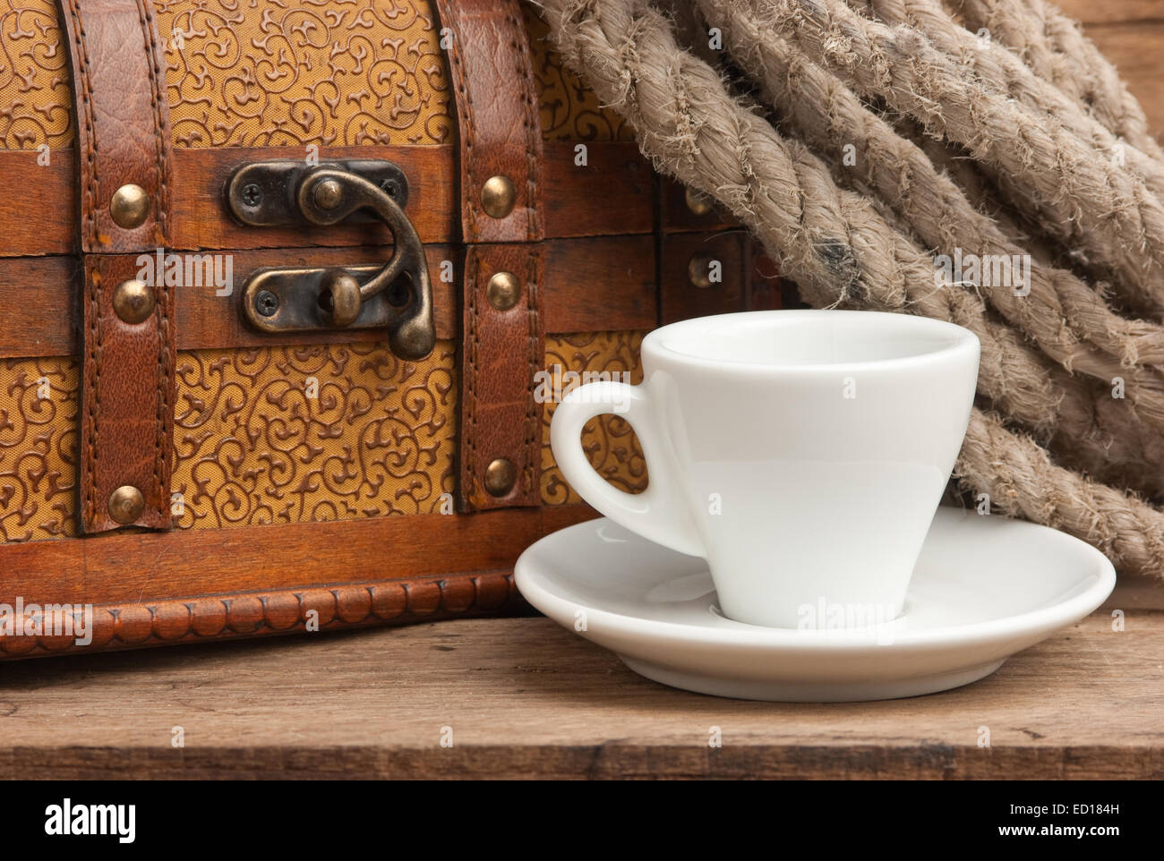cup of coffee and a chest, still life Stock Photo - Alamy