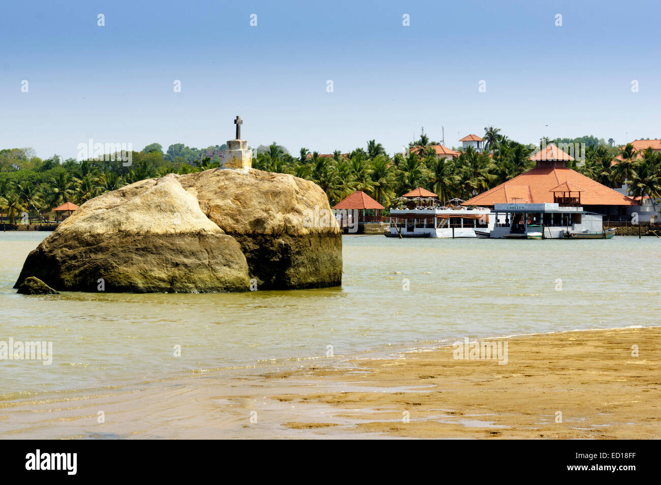 Kerala, India - Poovar Beach South. Rock with cross Stock Photo - Alamy