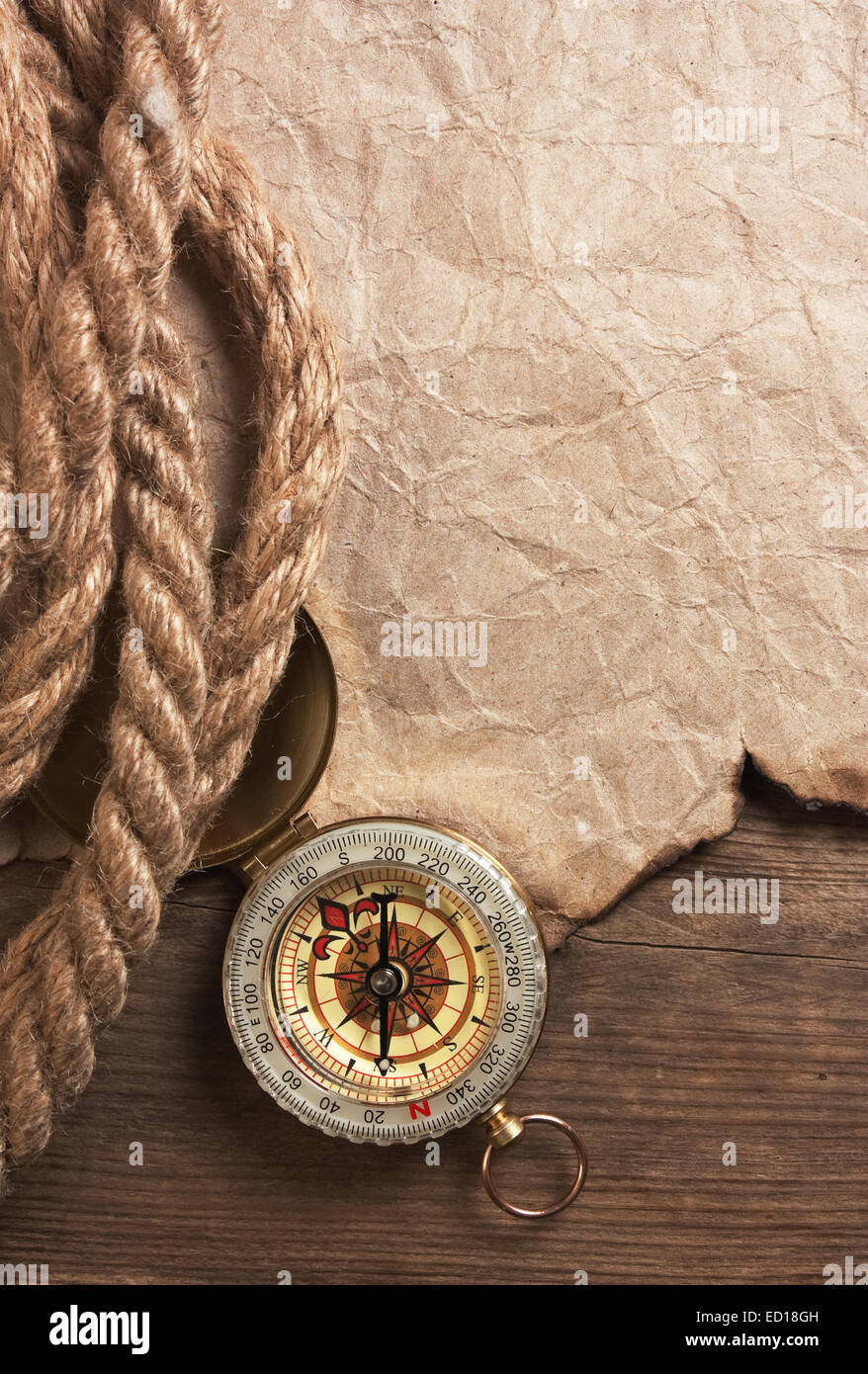 compass, old paper and rope, still-life Stock Photo - Alamy
