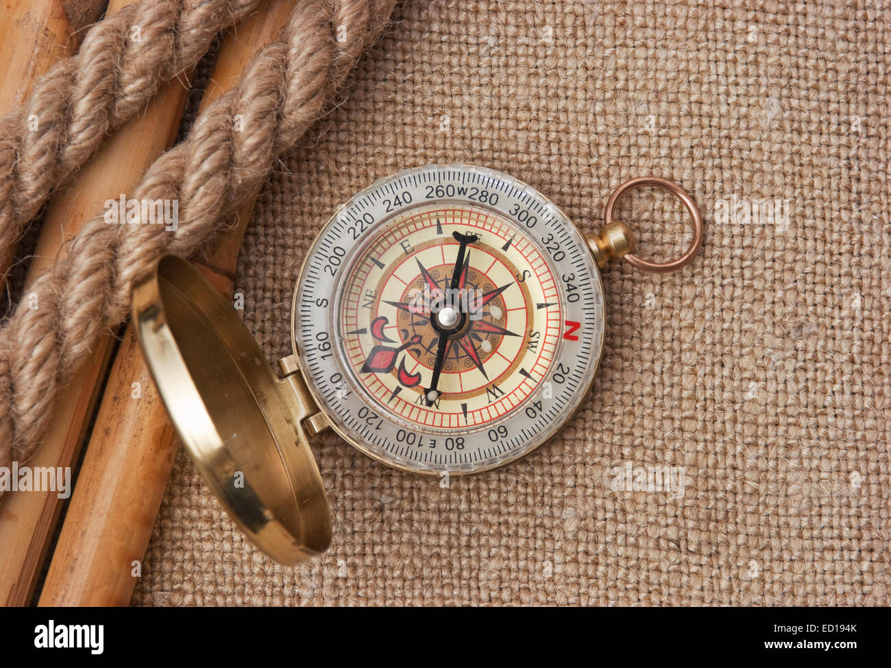 Compass with ropes and bamboo on a canvas Stock Photo - Alamy