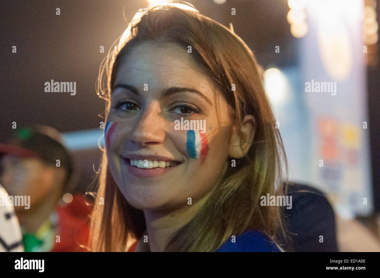 Fans at FIFA Fan Fest Rio de Janeiro watch the televised Group E match ...