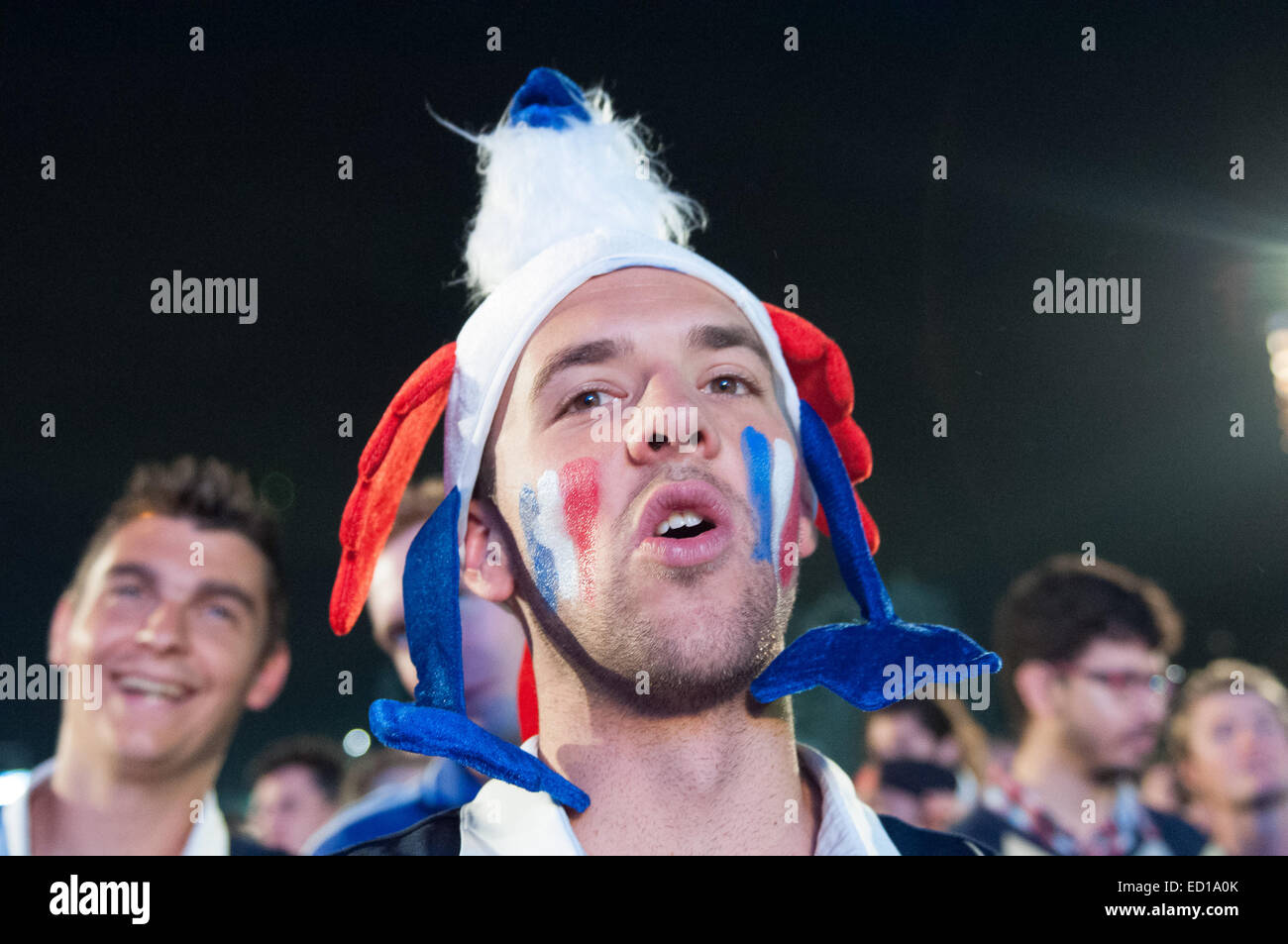 Fans at FIFA Fan Fest Rio de Janeiro watch the televised Group E match ...