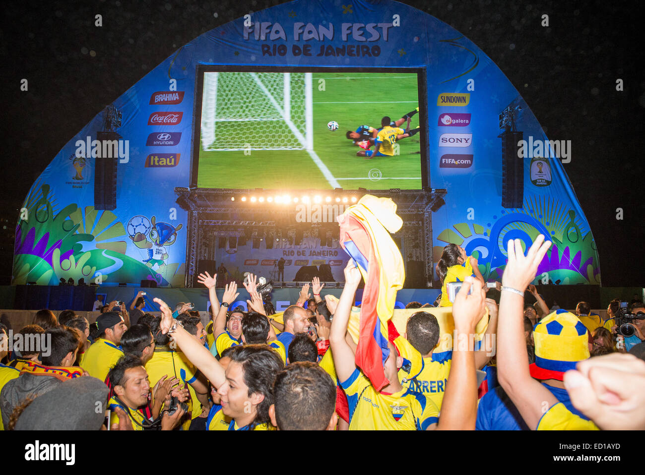 Fans at FIFA Fan Fest Rio de Janeiro watch the televised Group E match ...