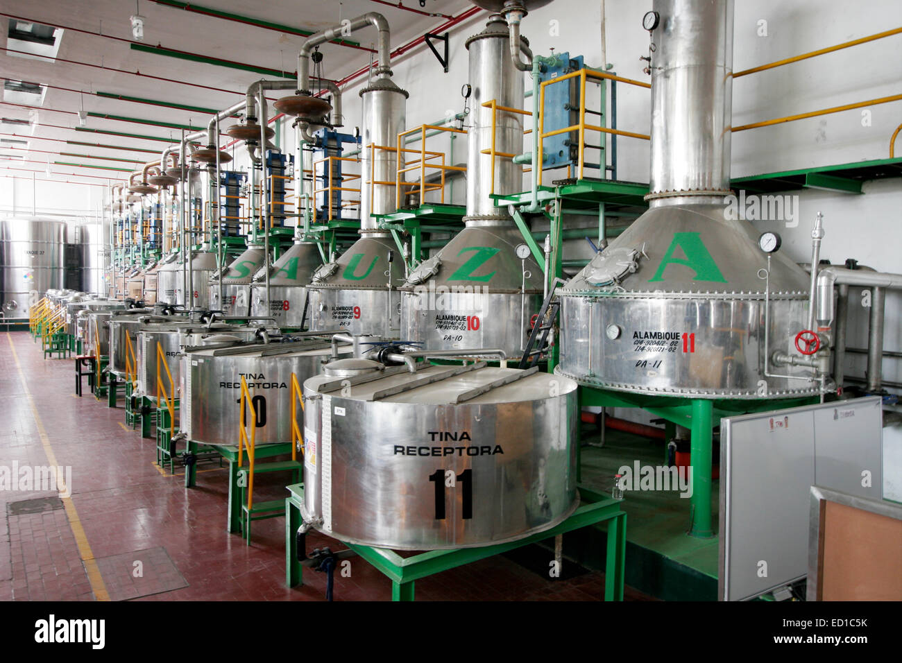 Stainless steel pot stills are used to distill tequila at Sauza's ...