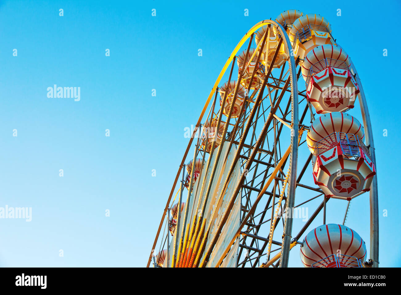 ferris wheel at sunrise Stock Photo - Alamy