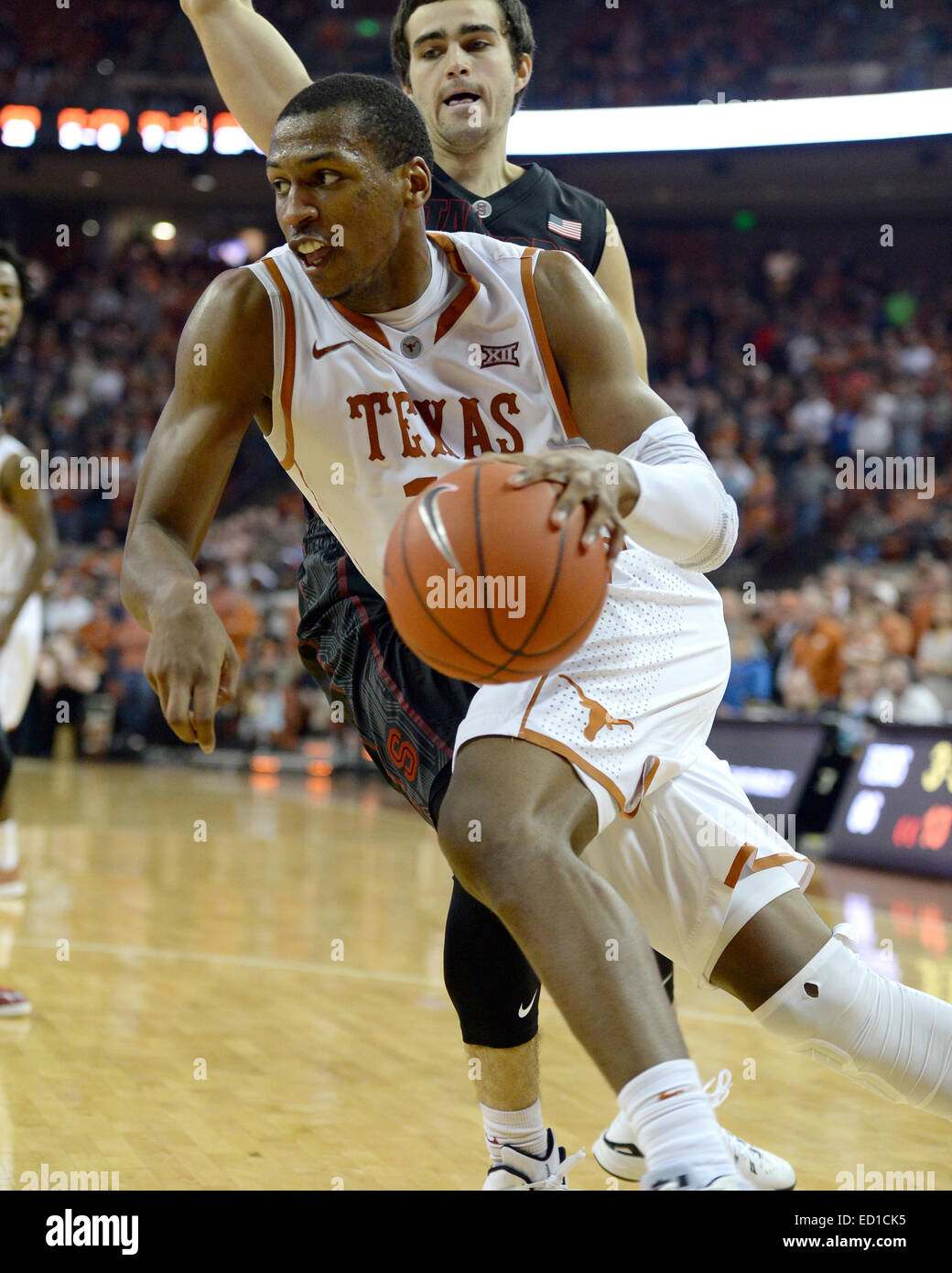 Austin, Texas. 23rd Dec, 2014. Jonathan Holmes #10 of the Texas ...