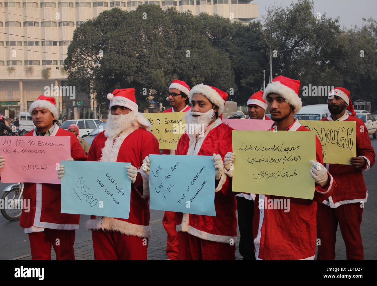 Members of Voice of Christen International wear the traditional santa ...