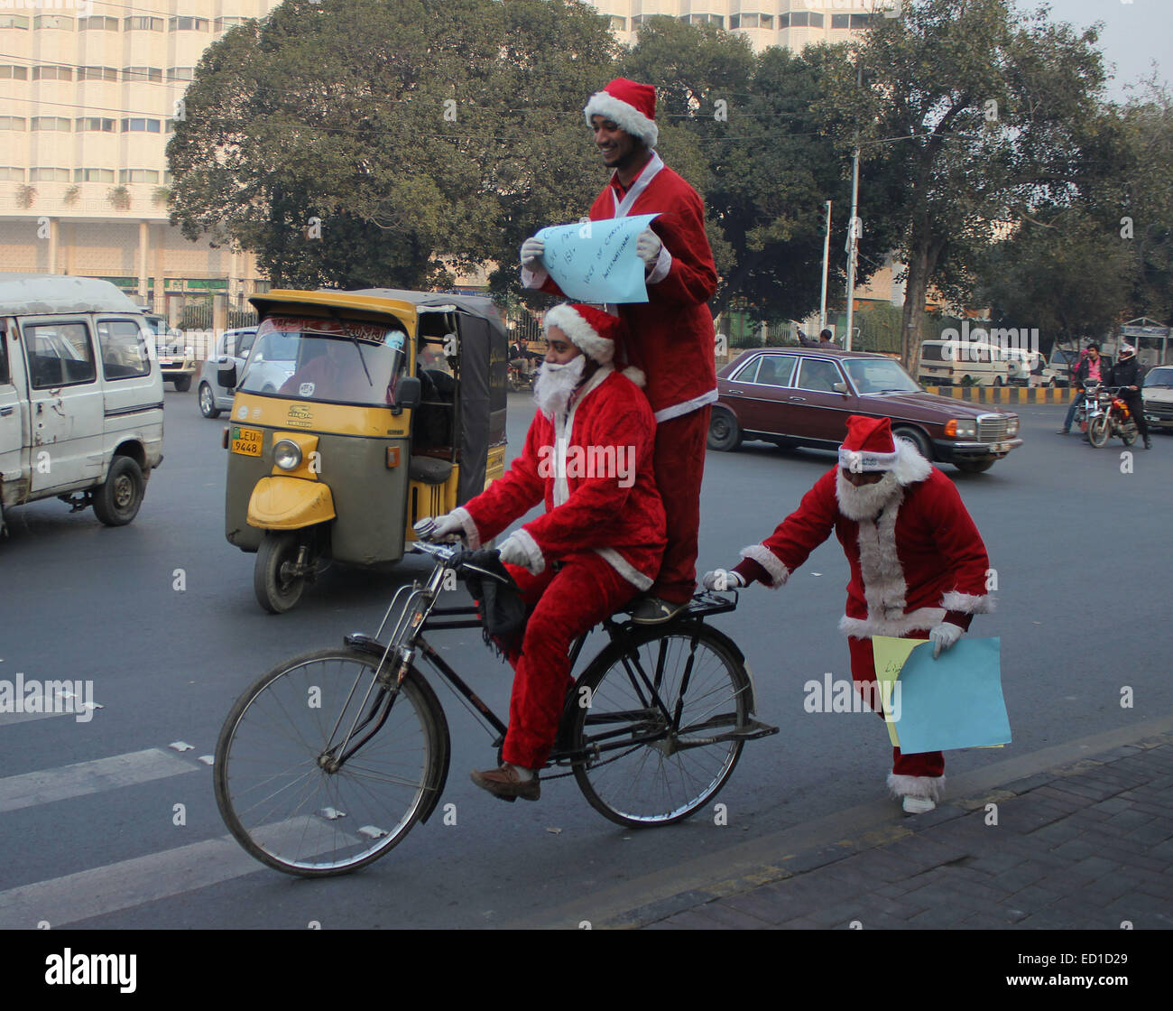 Members of Voice of Christen International wear the traditional santa ...