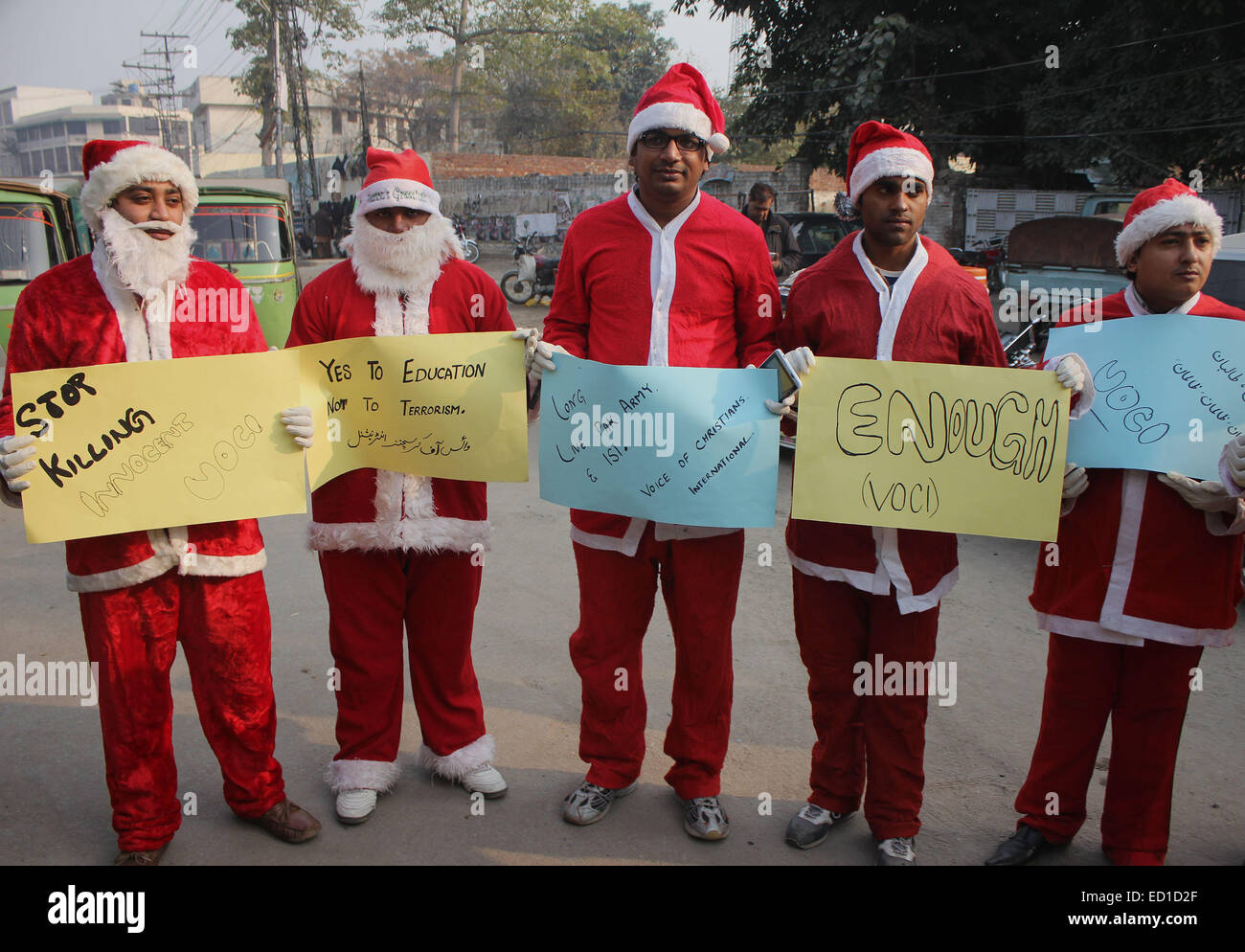 Members of Voice of Christen International wear the traditional santa ...