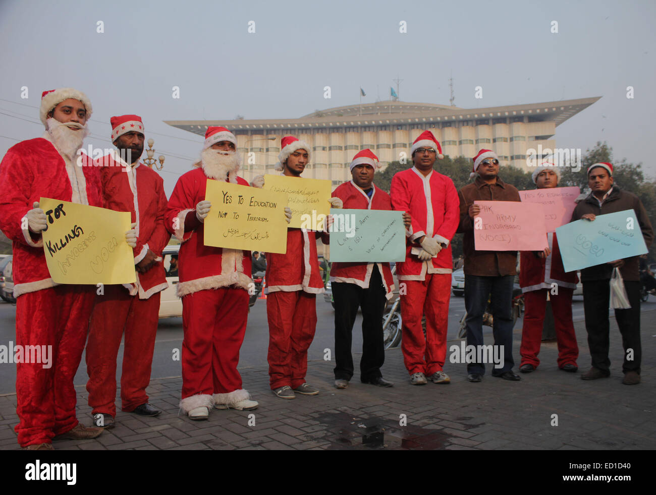 Members of Voice of Christen International wear the traditional santa ...
