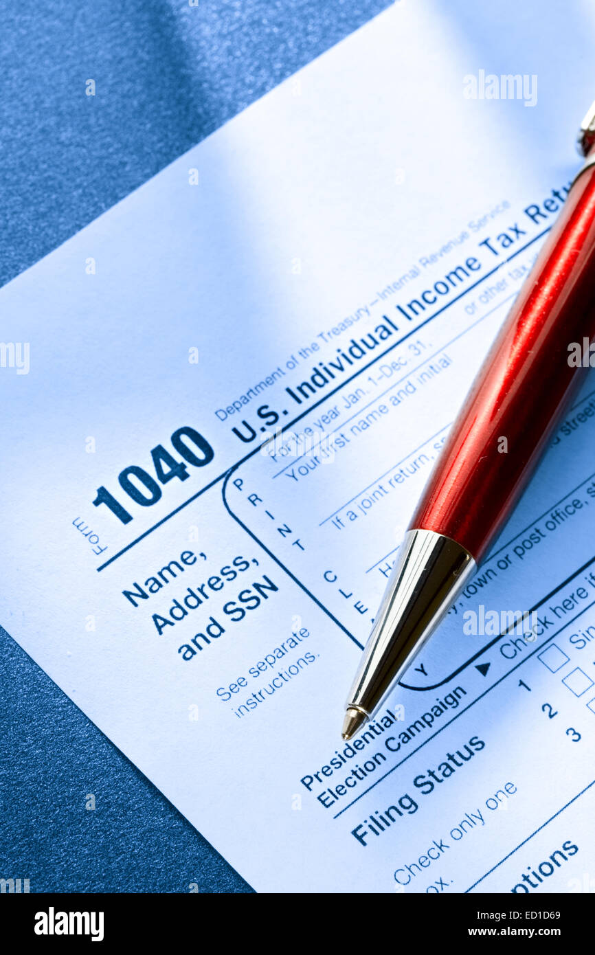 Tax form and a red pen Stock Photo - Alamy