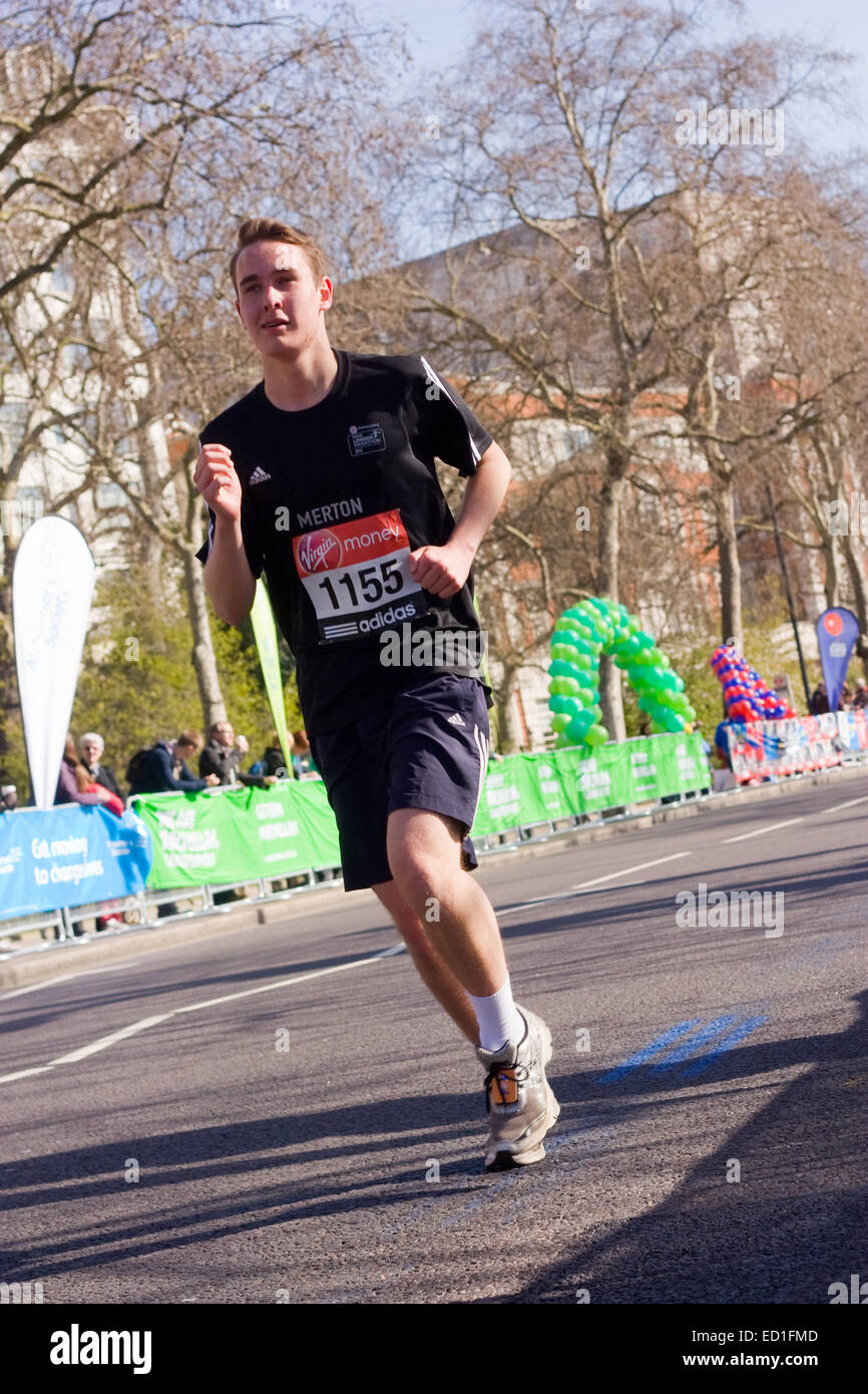 LONDON - APRIL 13: Unidentified children run the London marathon on ...
