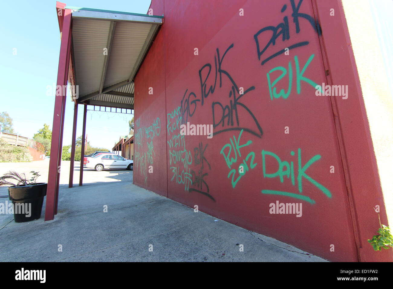 Wide angle, shot of graffiti on shop wall at Tecoma, Australia Stock ...