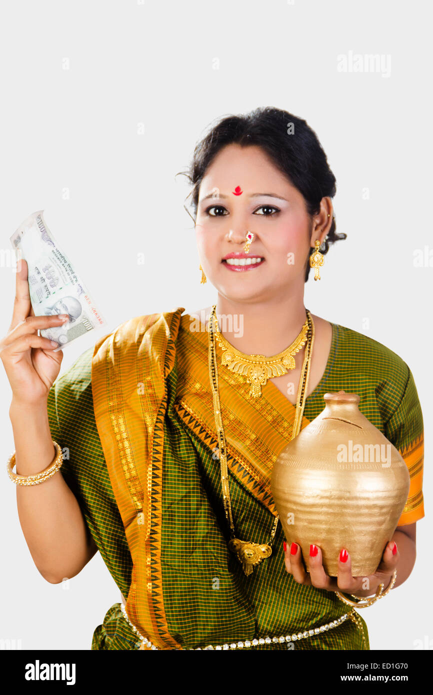1 South indian Lady saving money Piggy Bank Stock Photo - Alamy