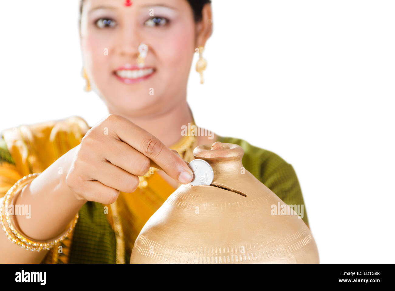 1 South indian Lady saving money Piggy Bank Stock Photo - Alamy