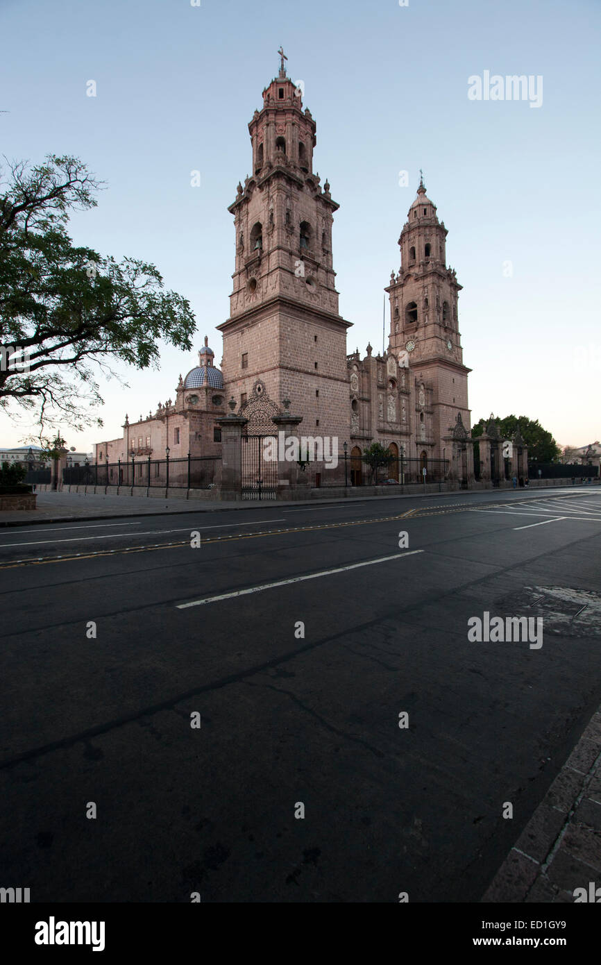 Built of rose colored stone, the Cathedral of Morelia reflects a blend ...