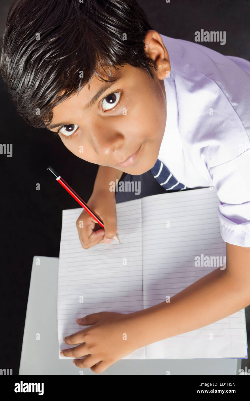 1 indian child school student study writing Stock Photo - Alamy