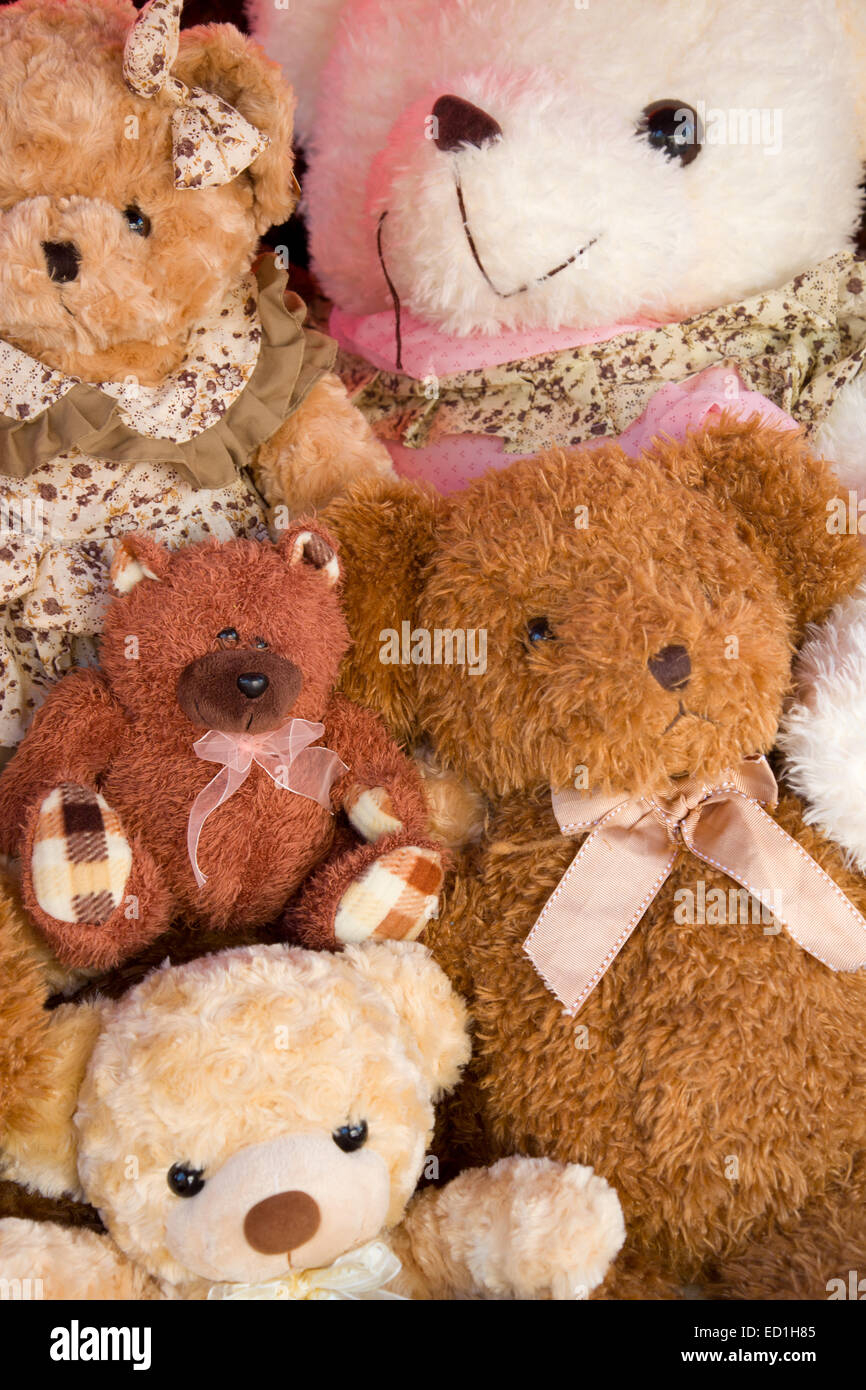 A stack of stuffed toy bear in a very fortunate child's bedroom,gifts ...