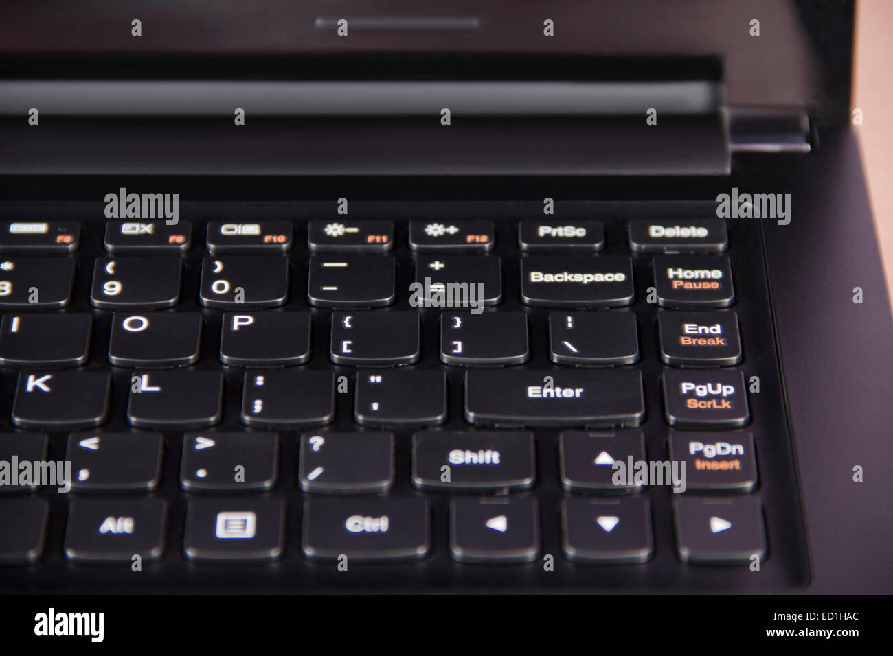 Laptop computer keyboard controlling hi-res stock photography and ...