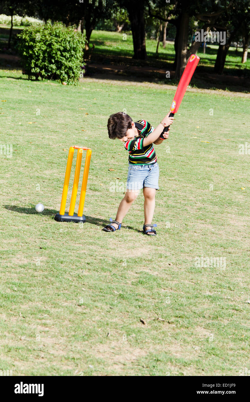 Indian kid play cricket hi-res stock photography and images - Alamy