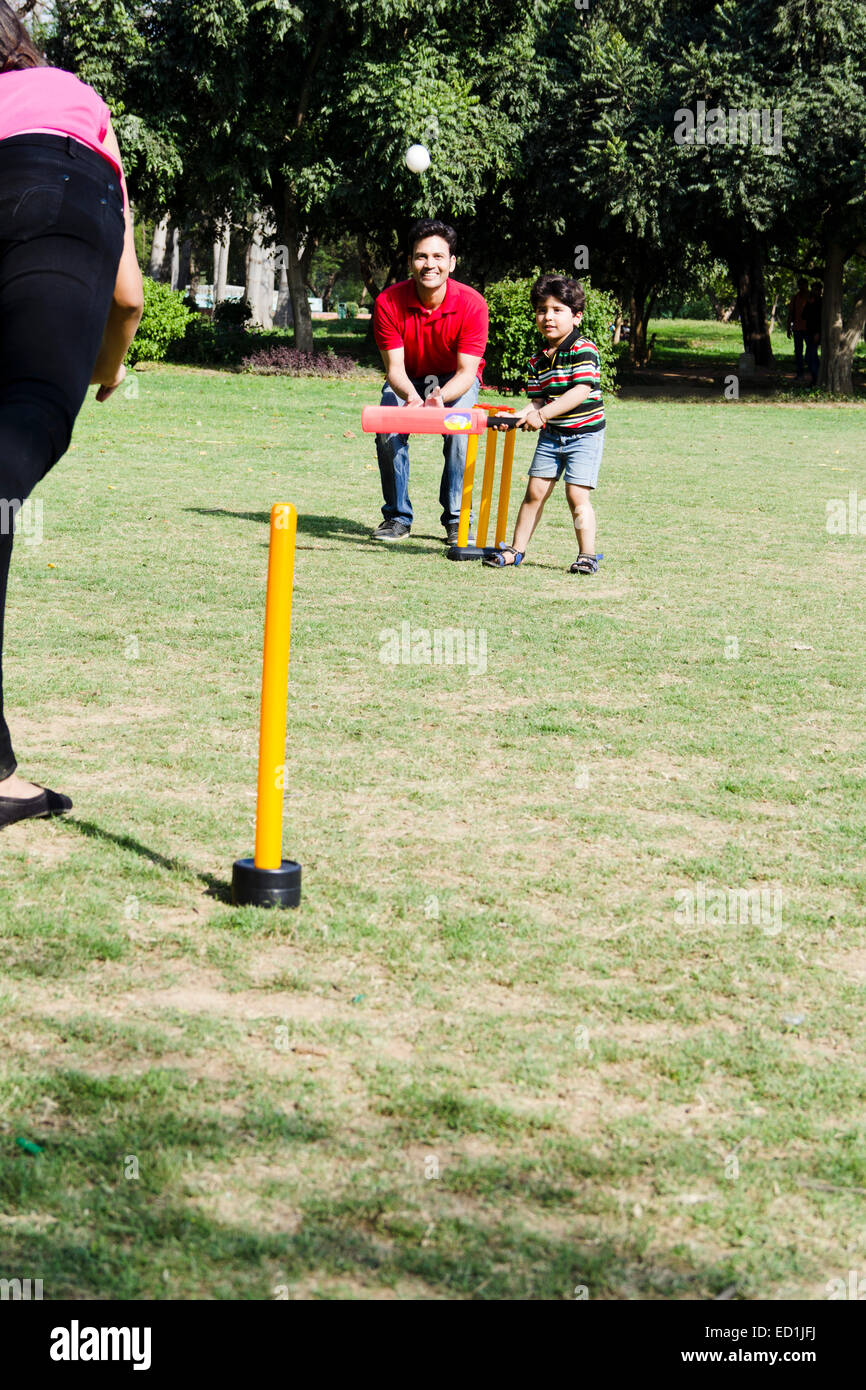Boy playing cricket father hi-res stock photography and images - Alamy