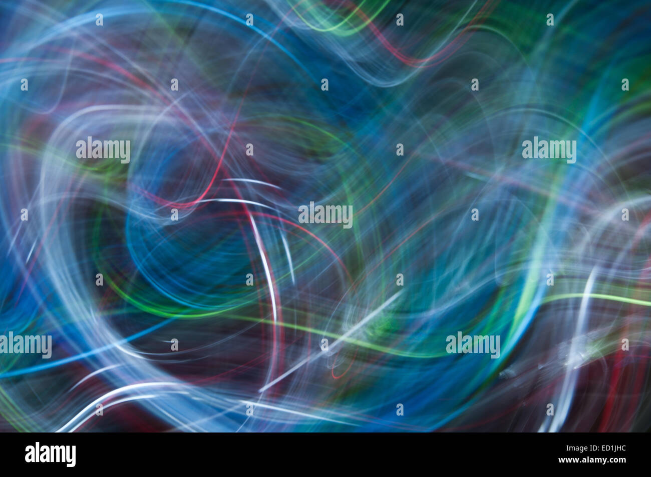 swirling spinning motion and trails traces of moving lights creating ...