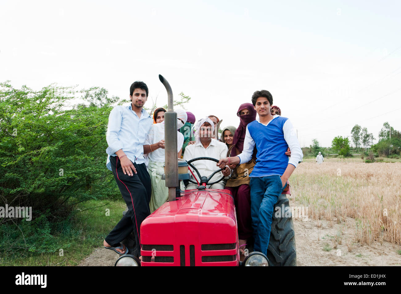 indian Farmer Family riding Tractor Stock Photo - Alamy