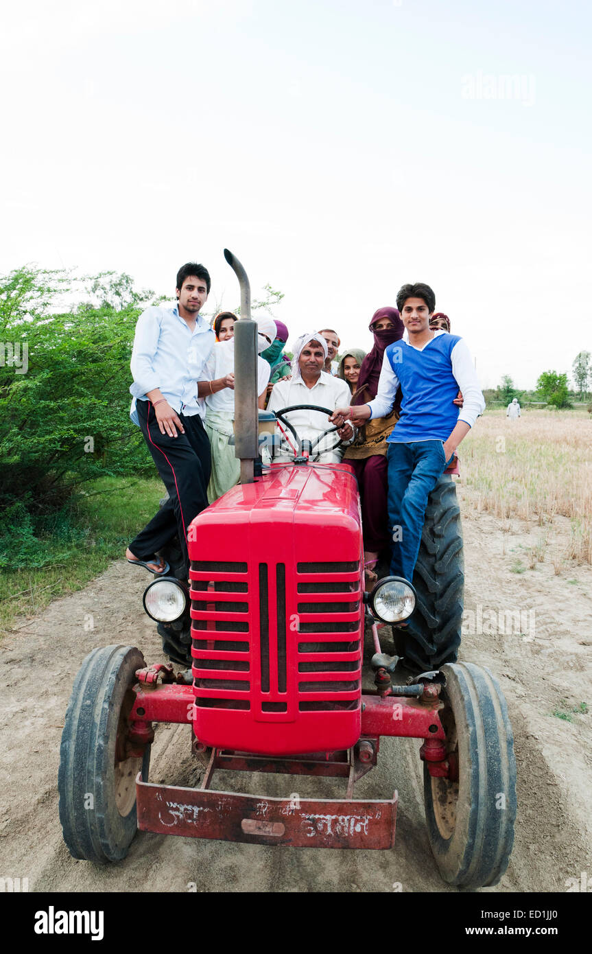 indian Farmer Family riding Tractor Stock Photo - Alamy