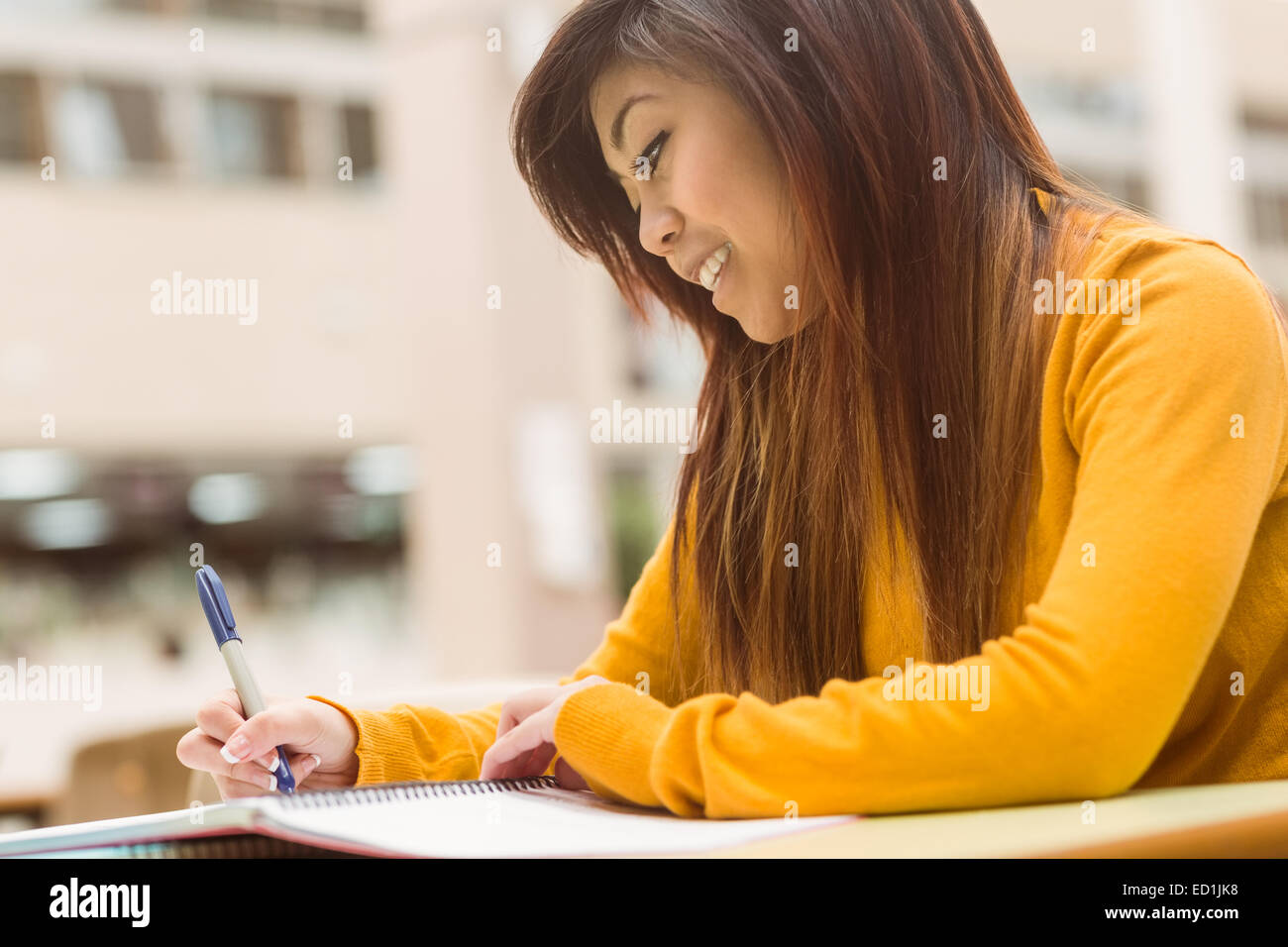 Female asian student sitting table hi-res stock photography and images ...