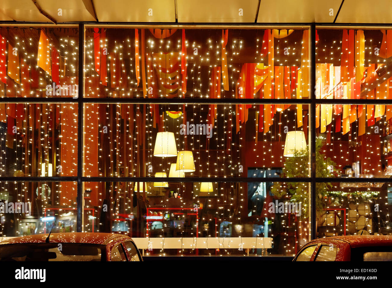 Christmas illumination of restaurant window in night Stock Photo - Alamy