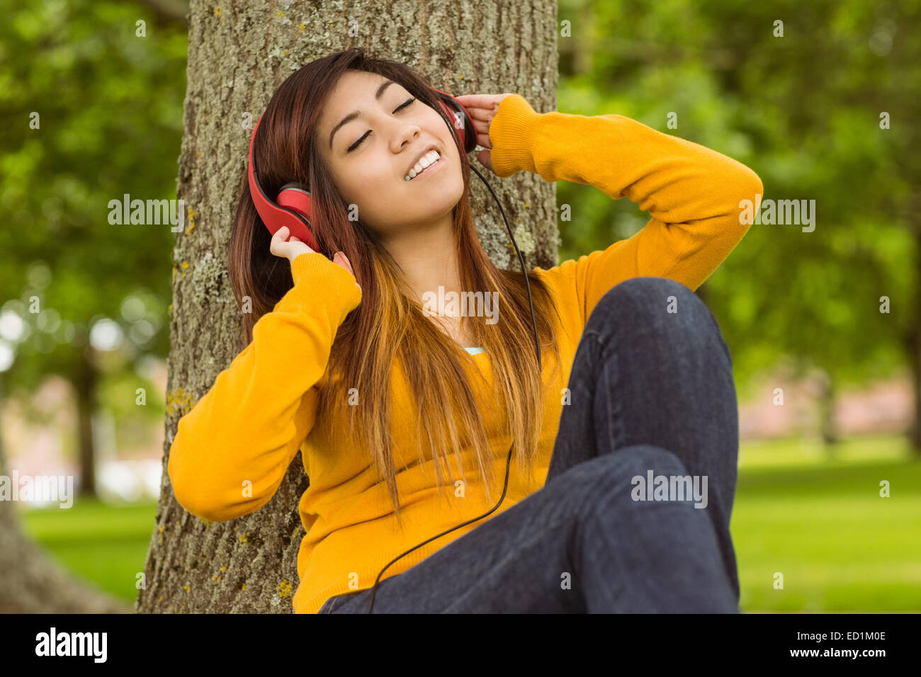 Relaxed young woman in headphones hi-res stock photography and images ...
