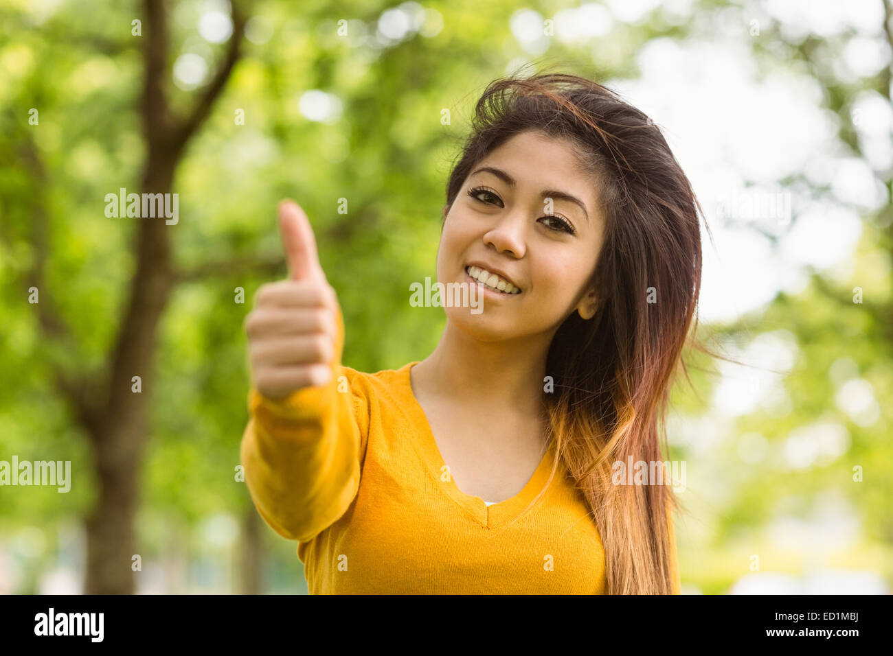 Thumbs up beautiful woman hi-res stock photography and images - Alamy