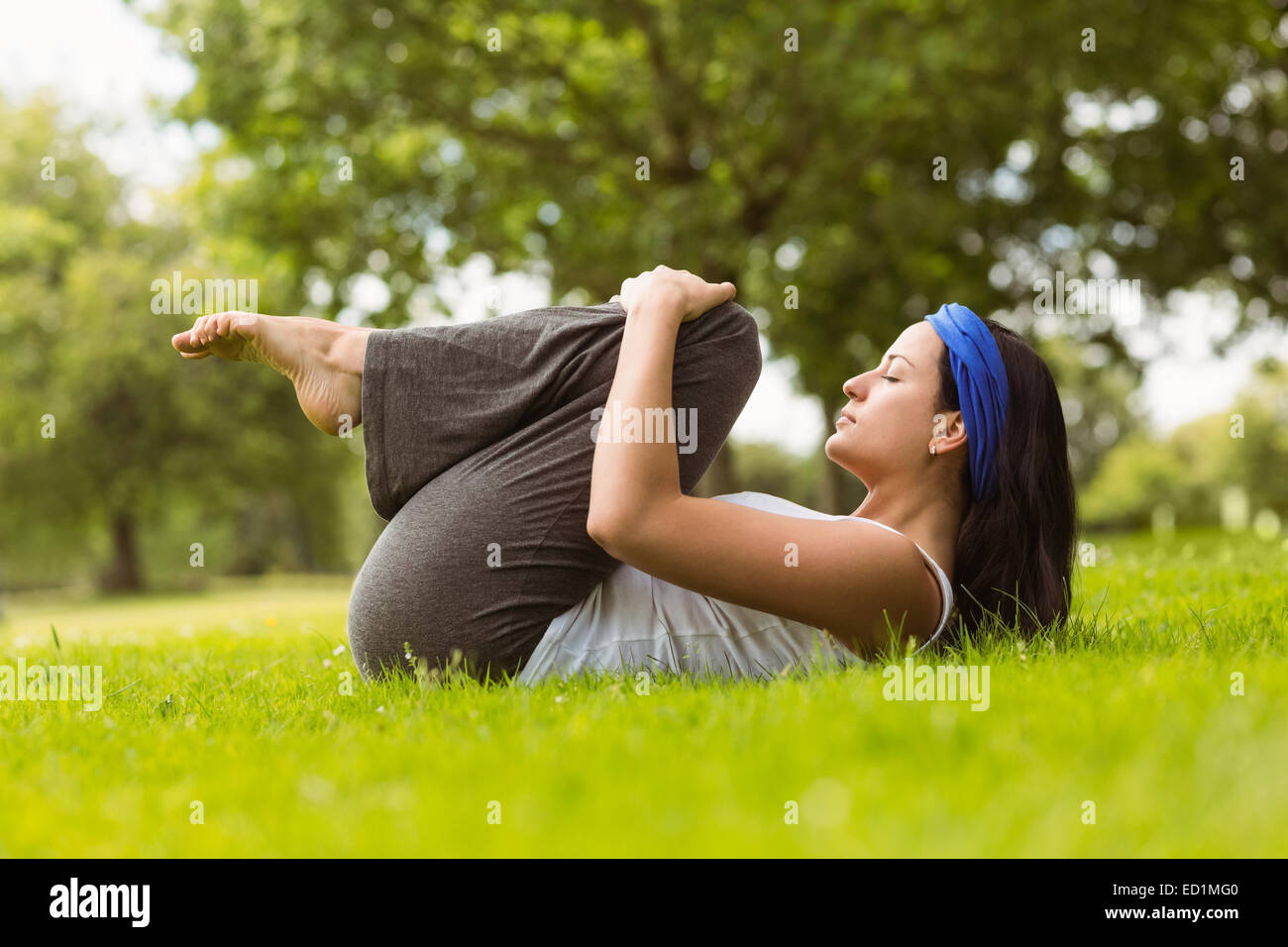 Yoga on grass hi-res stock photography and images - Alamy