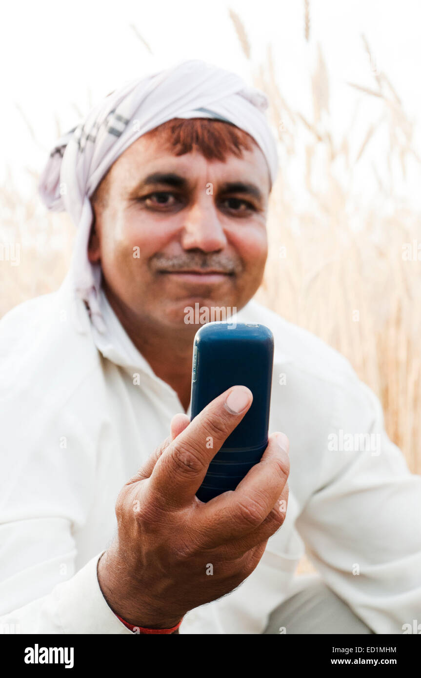 1 indian Village rural man Dialing phone Stock Photo - Alamy