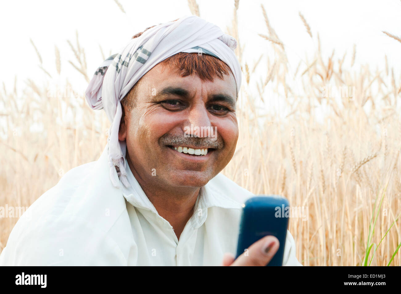 1 indian Village rural man Dialing phone Stock Photo - Alamy